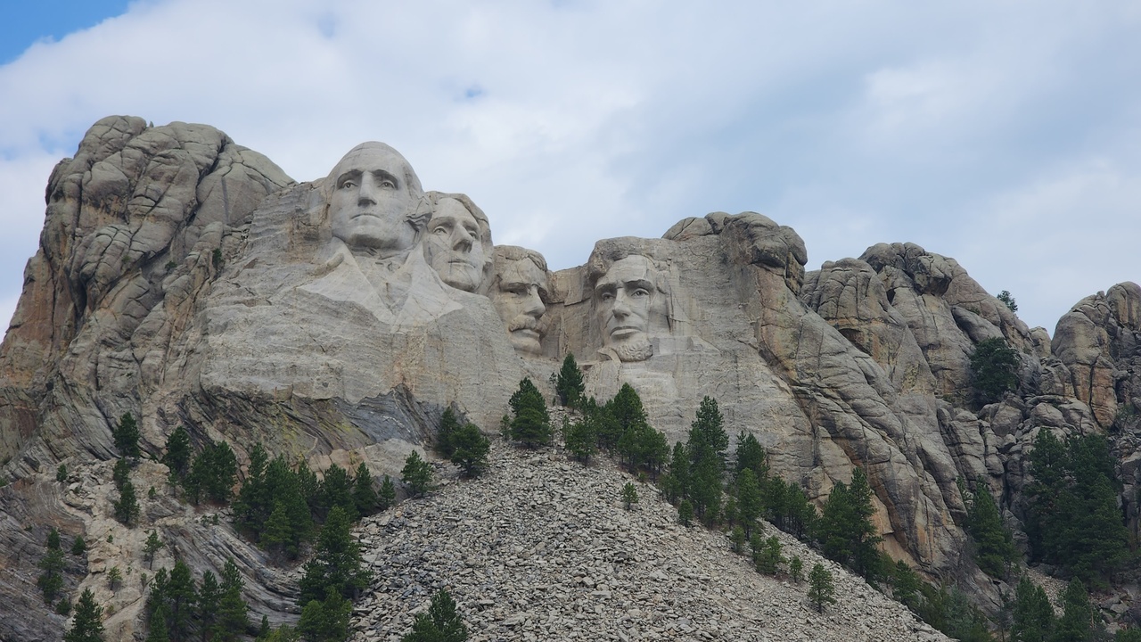 Where else can you drive past bison, duck into caves and stare up at ...