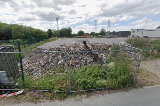 Large industrial building planned for vacant land near ecology trail