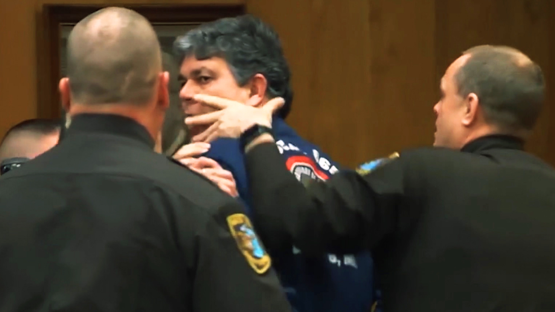 Father of victim lunges at Larry Nassar