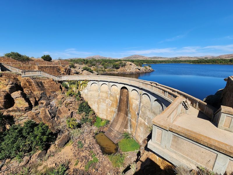 This Oklahoma dam stands tall over a quiet lake with views that feel ...