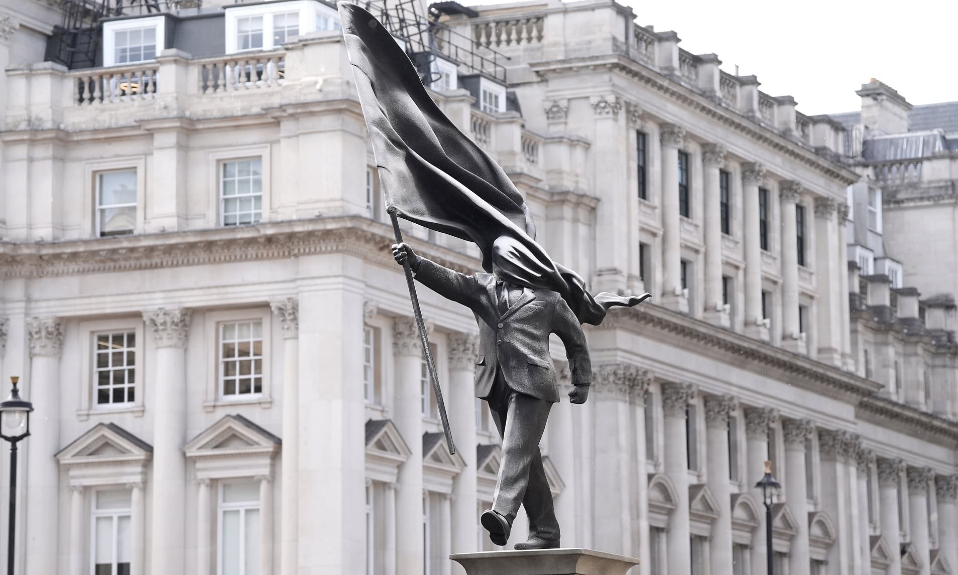 Is this London's latest Banksy? Mystery statue of man blinded by flag ...
