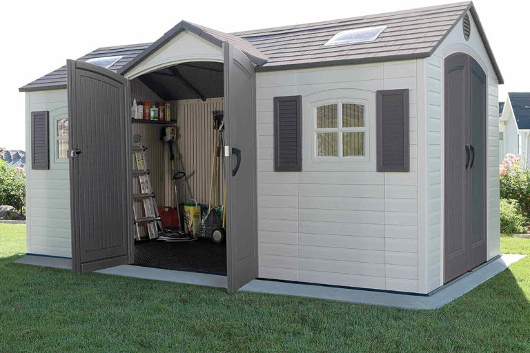 This Amazon storage shed has charming details like shutters and ...
