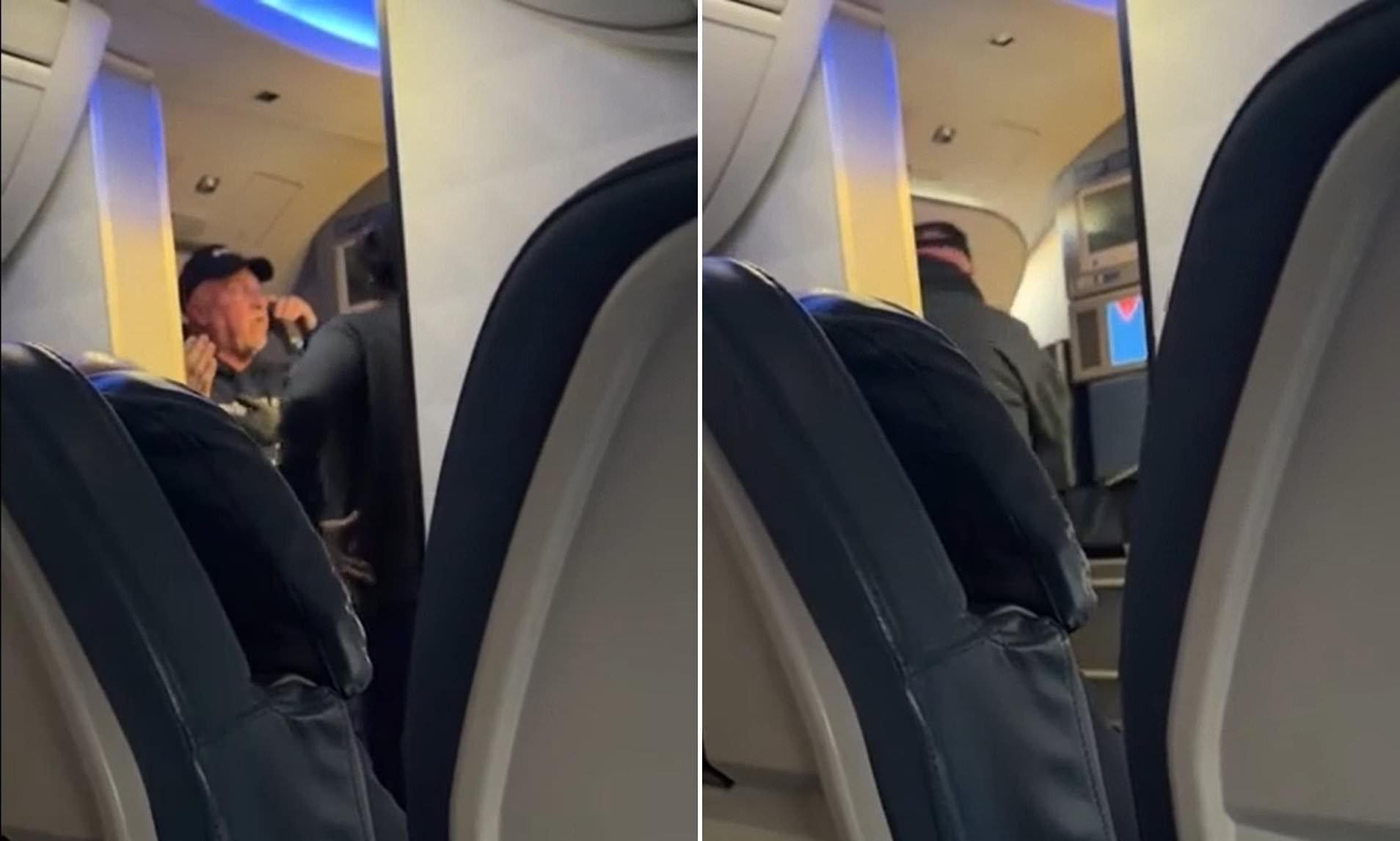 Wild moment furious passenger tries to open exit door on delayed Delta ...