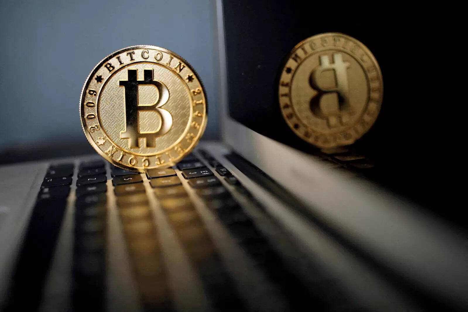 Bitcoin trades near $76K, falls for second day after US Fed, slips ...