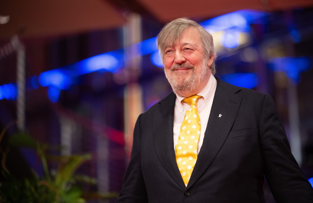Sir Stephen Fry sues conference organisers after horror fall from stage