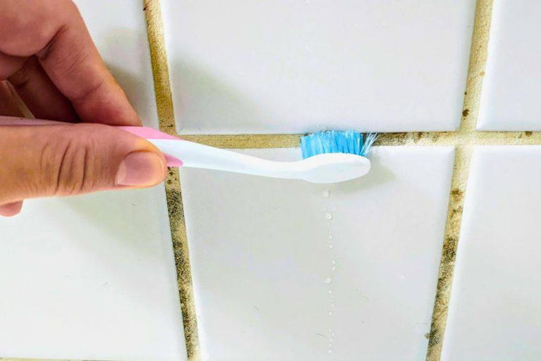 Black spotty shower grout will turn white in 10 minutes if cleaned with ...