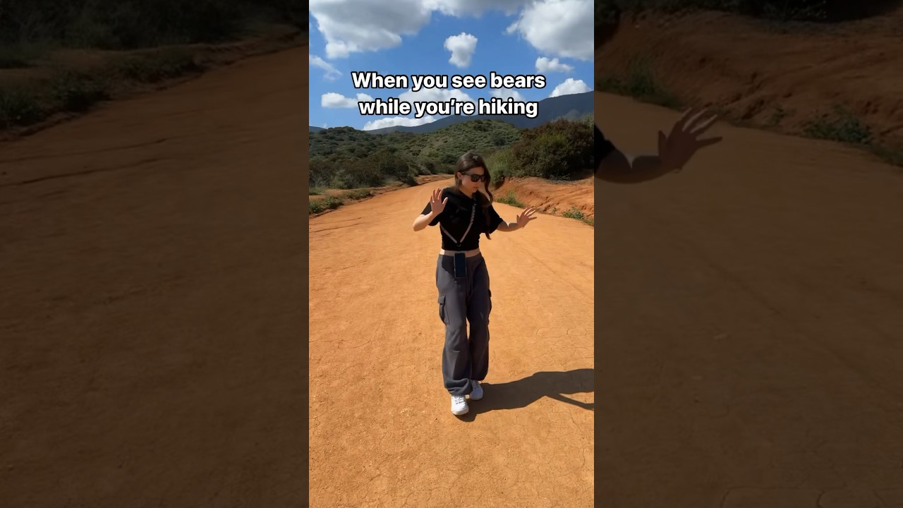 Hiking couple has an unexpected run-in with some bears