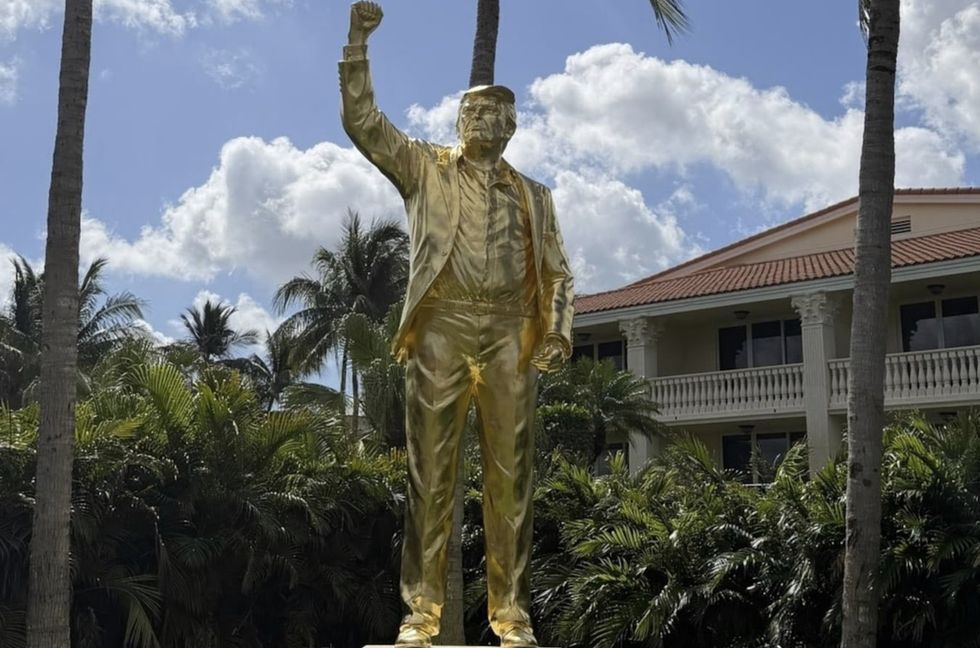Donald Trump erects 15-foot gold statue of himself at golf course days ...