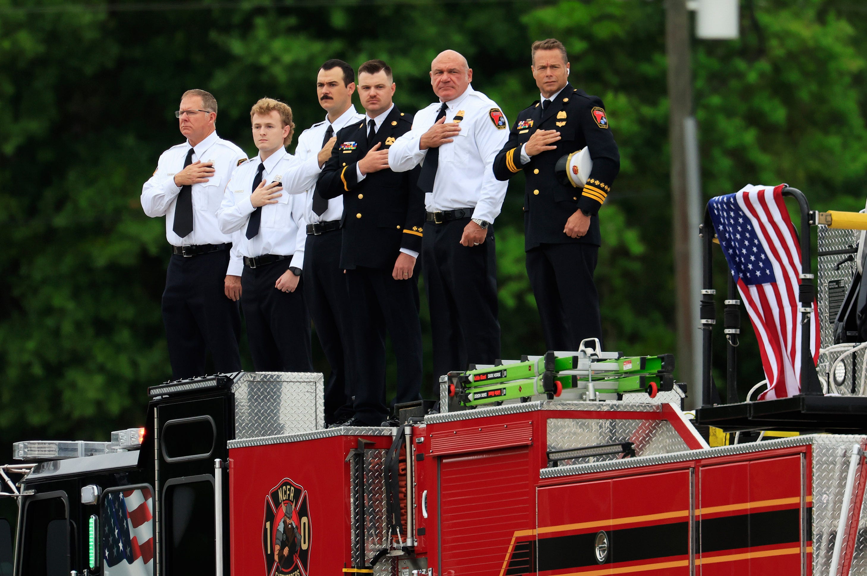 'Standing on sacred ground,' funeral and procession honors firefighter