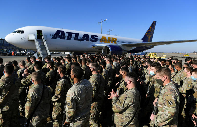 President Donald Trump reviews reducing US troops in Germany