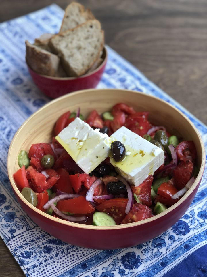 Greek people don't use vinegar in their Greek salads—they do this instead