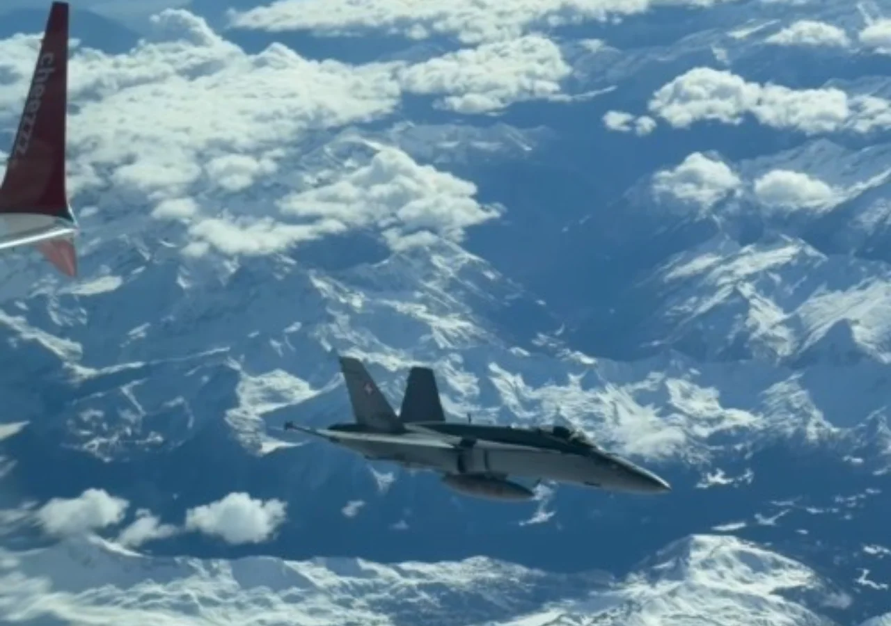 An airline pilot was cruising at 36,000 feet over Switzerland when two ...