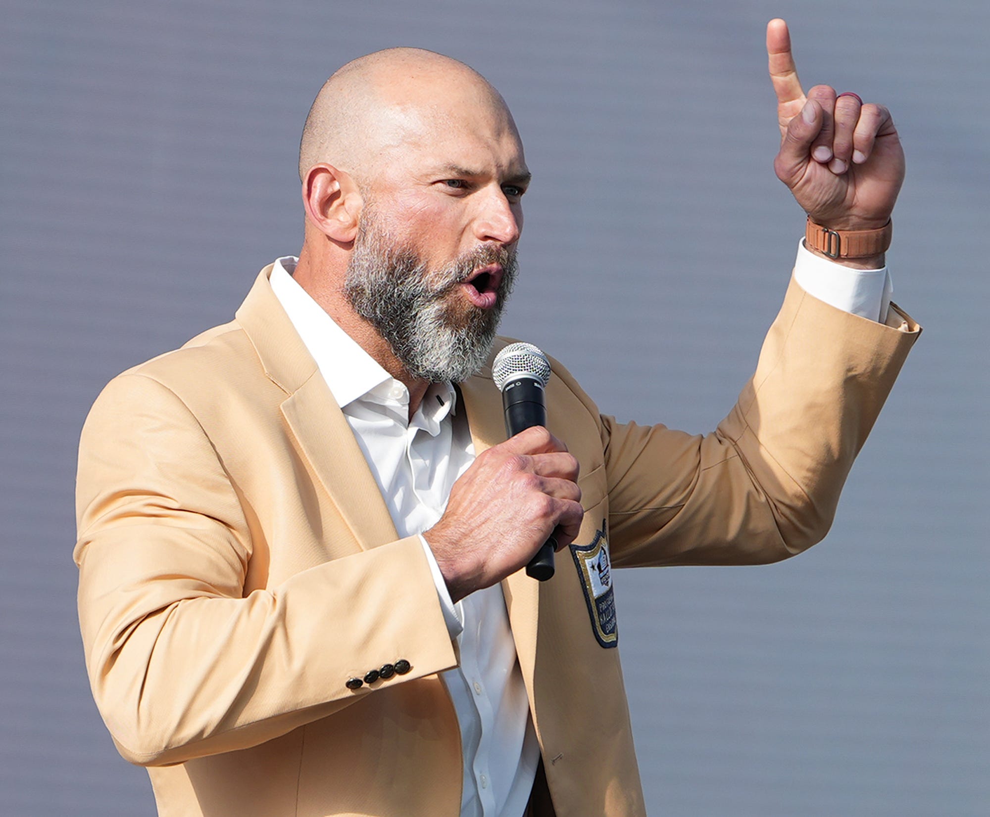 Why was Joe Thomas at a Packers practice wearing team gear?