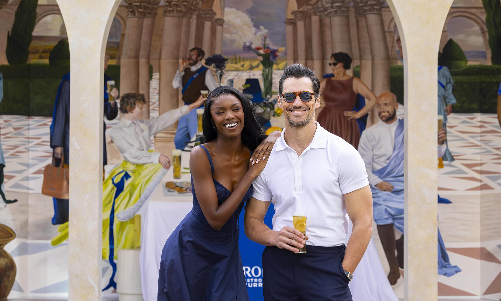 David Gandy and Leomie Anderson pour beers in front of the 'Il Fresco ...