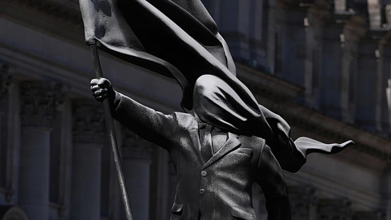 Crowds gather in central London after Banksy confirms new statue
