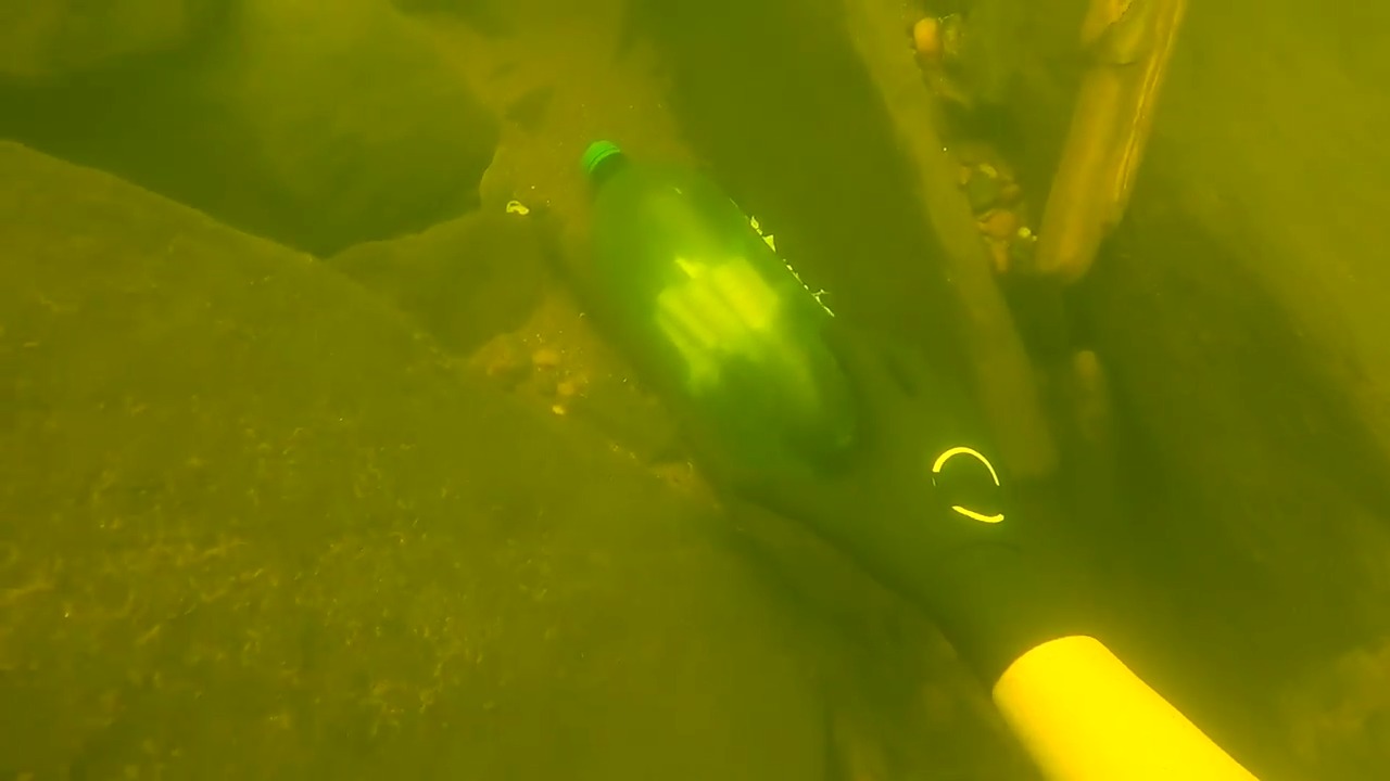 He expected lost phones in the river, then found a voodoo bottle with ...