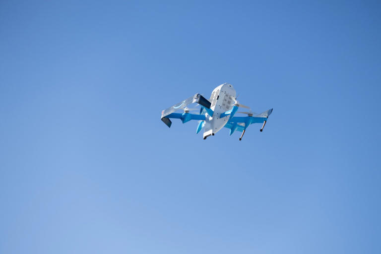 Amazon drone delivers first UK parcels with packages arriving in under ...