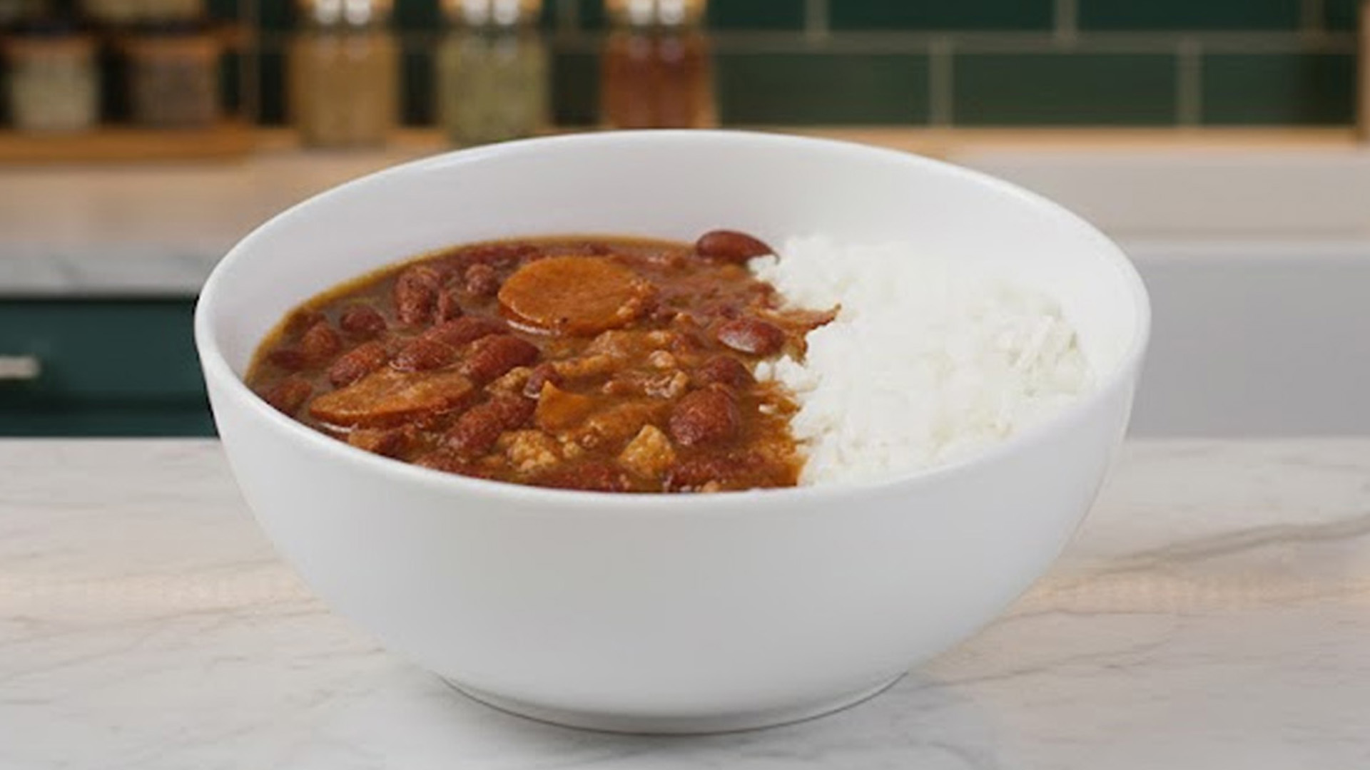 How to make hearty sausage and bean stew with rice