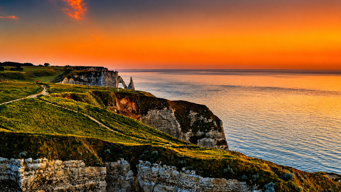 Beautiful coastal path along cliffs during sunset