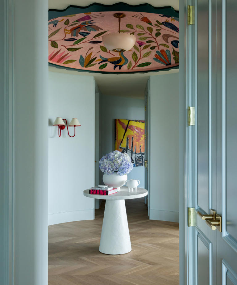 How a pale blue entryway creates a calm and dramatic first impression