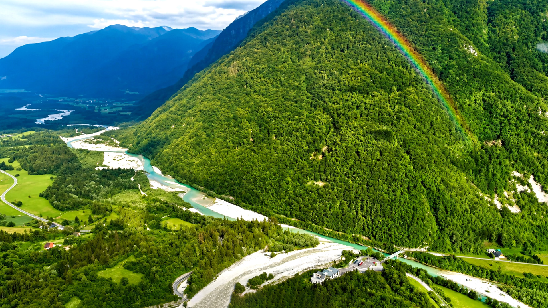 The emerald Soča River flowing through the Bovec Valley