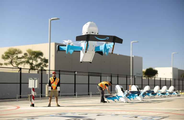 Amazon drone delivers first UK parcels with packages arriving in under ...