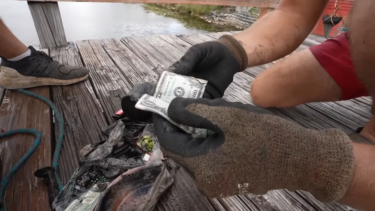There's money in the bag! - Seconds later they found voodoo items nearby