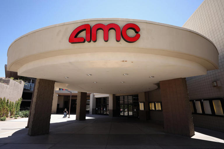 AMC rolls out pizza, pickles and corn poppers as part of theater menu