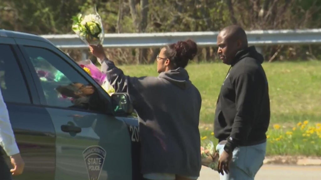 Fallen trooper Kevin Trainor's fiancée lays flowers on his ...