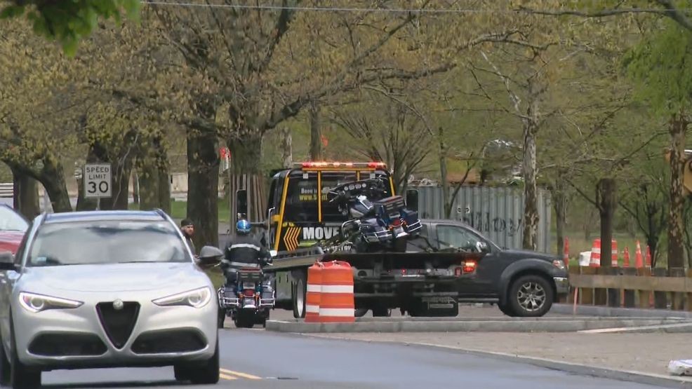 Officer involved in police escort struck by vehicle in New Bedford