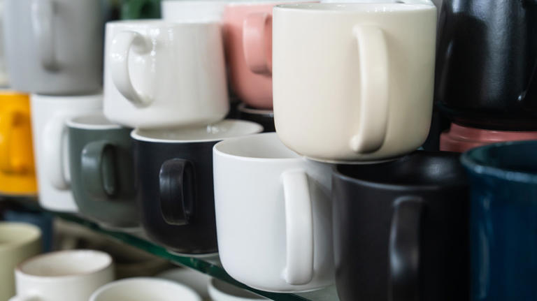 Keep mugs out of the kitchen cabinets with a cute alternative solution
