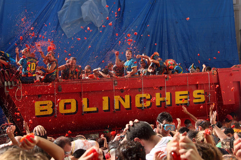 The Spanish town where 20,000 people throw 150 tonnes of tomatoes at ...