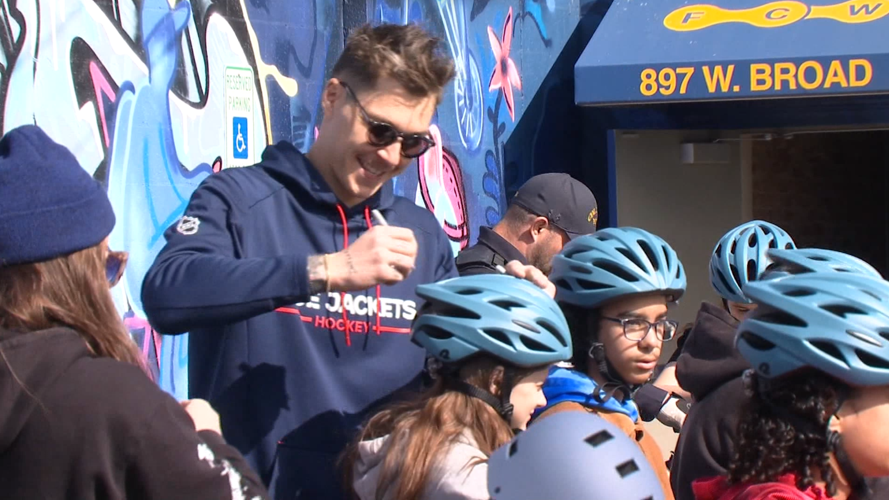 Blue Jackets goaltender gives, rides bikes with kids