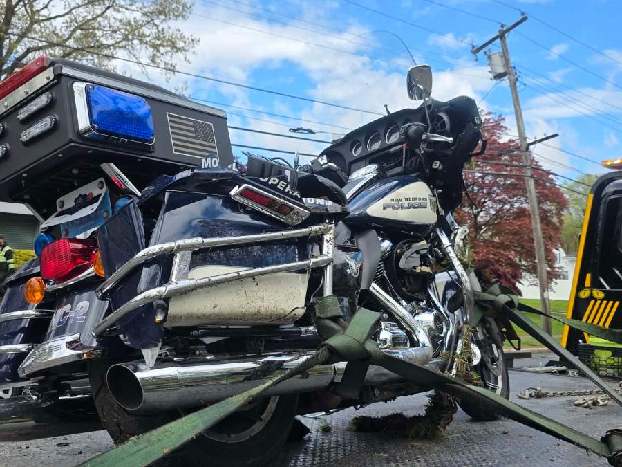 New Bedford officer on motorcycle struck during police escort