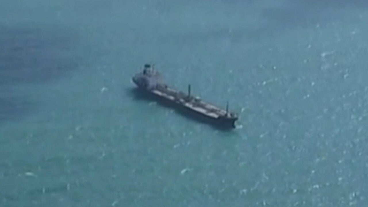 US warships face Iranian assault in Strait of Hormuz