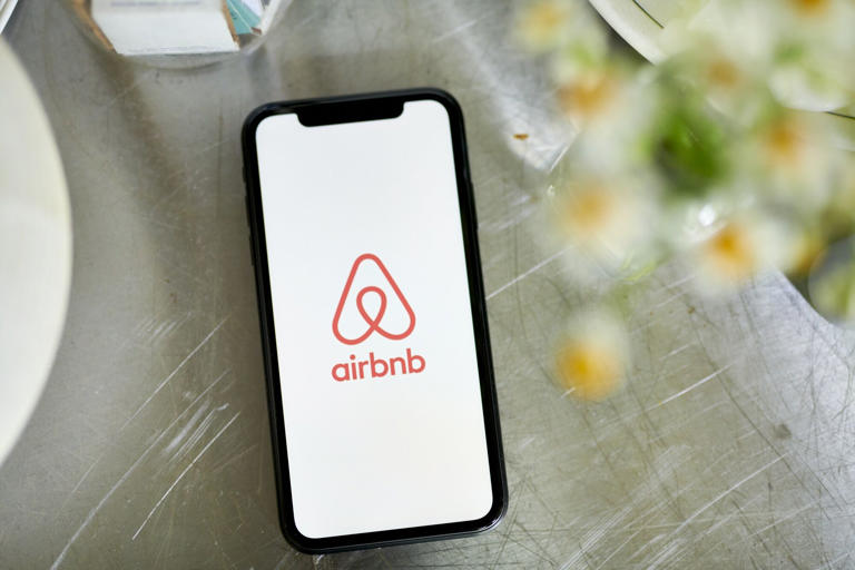 Airbnb boosts annual sales outlook while spending picks up