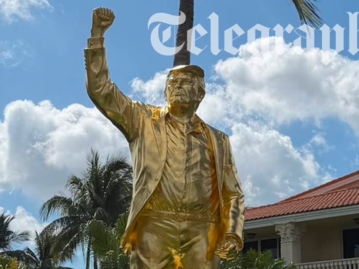 Trump unveils 6-meter golden statue commissioned by patriots