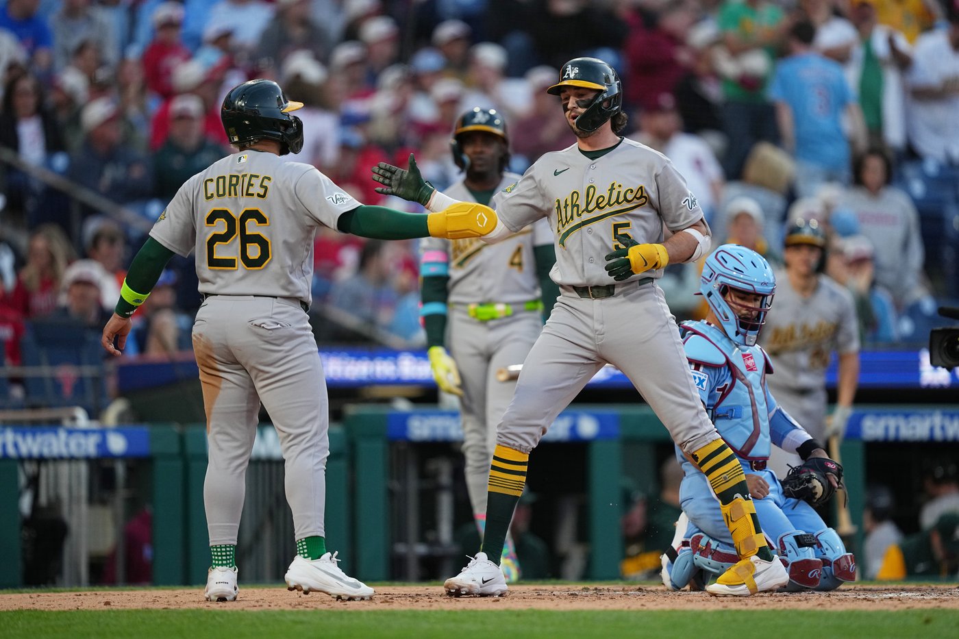 Ginn goes 8 innings and Gelof hits one of four A's homers in 12-1 rout ...