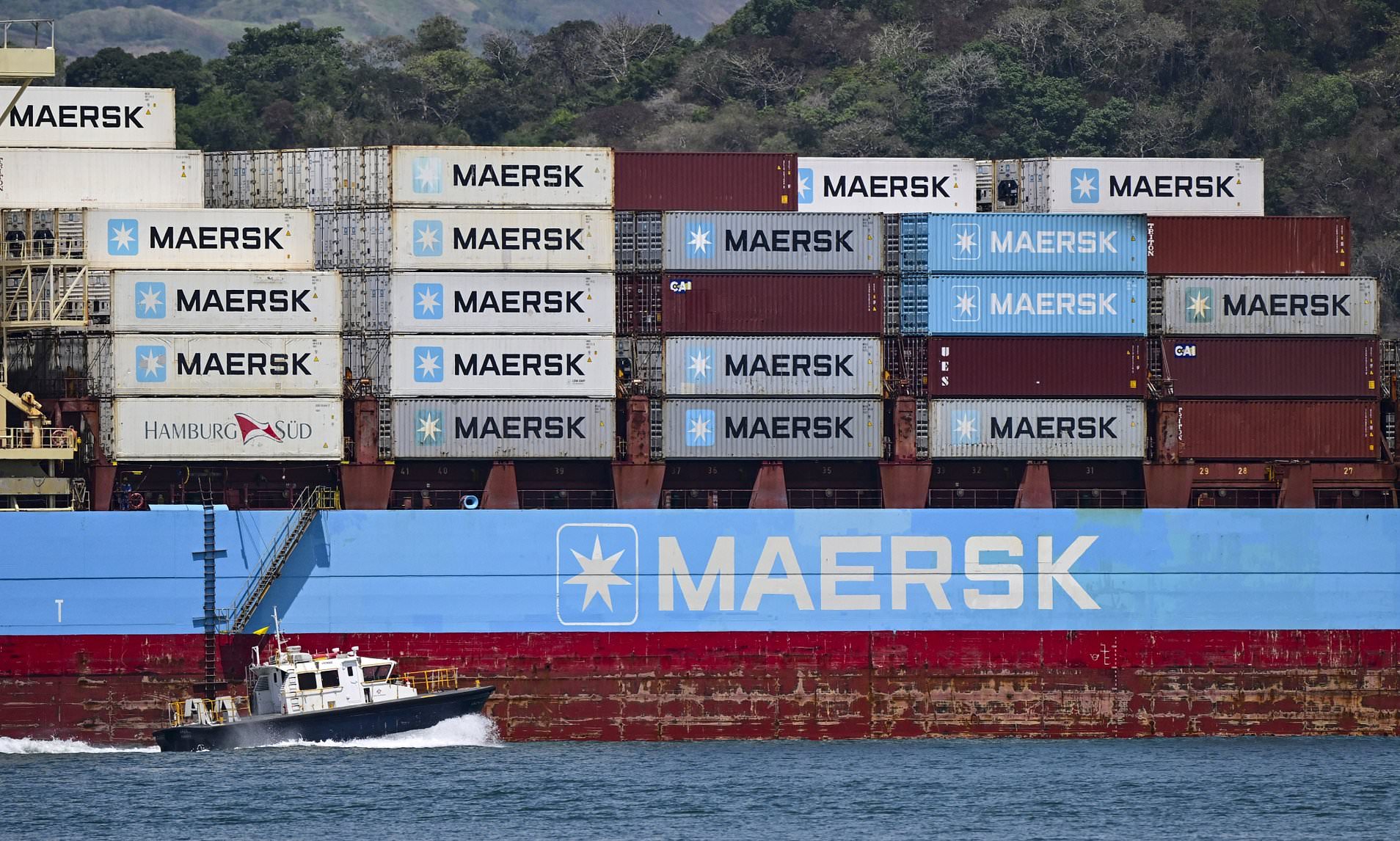 Shipping container giant Maersk to pass on soaring costs from the Iran ...