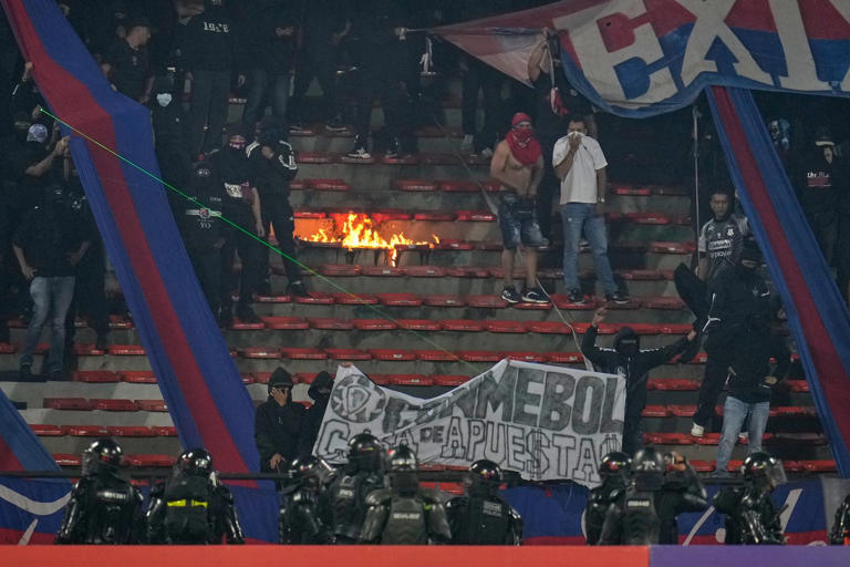Copa Libertadores soccer match halted after just 3 minutes when fans ...