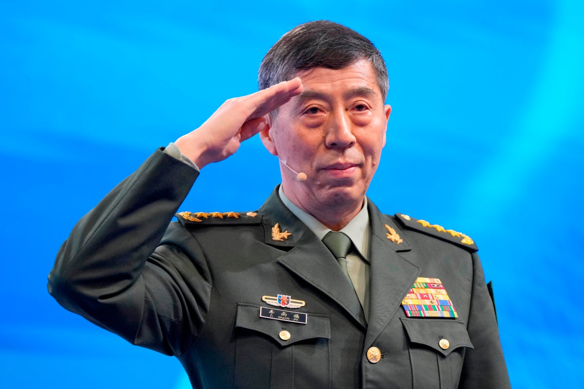 Two Chinese former ministers handed suspended death sentences