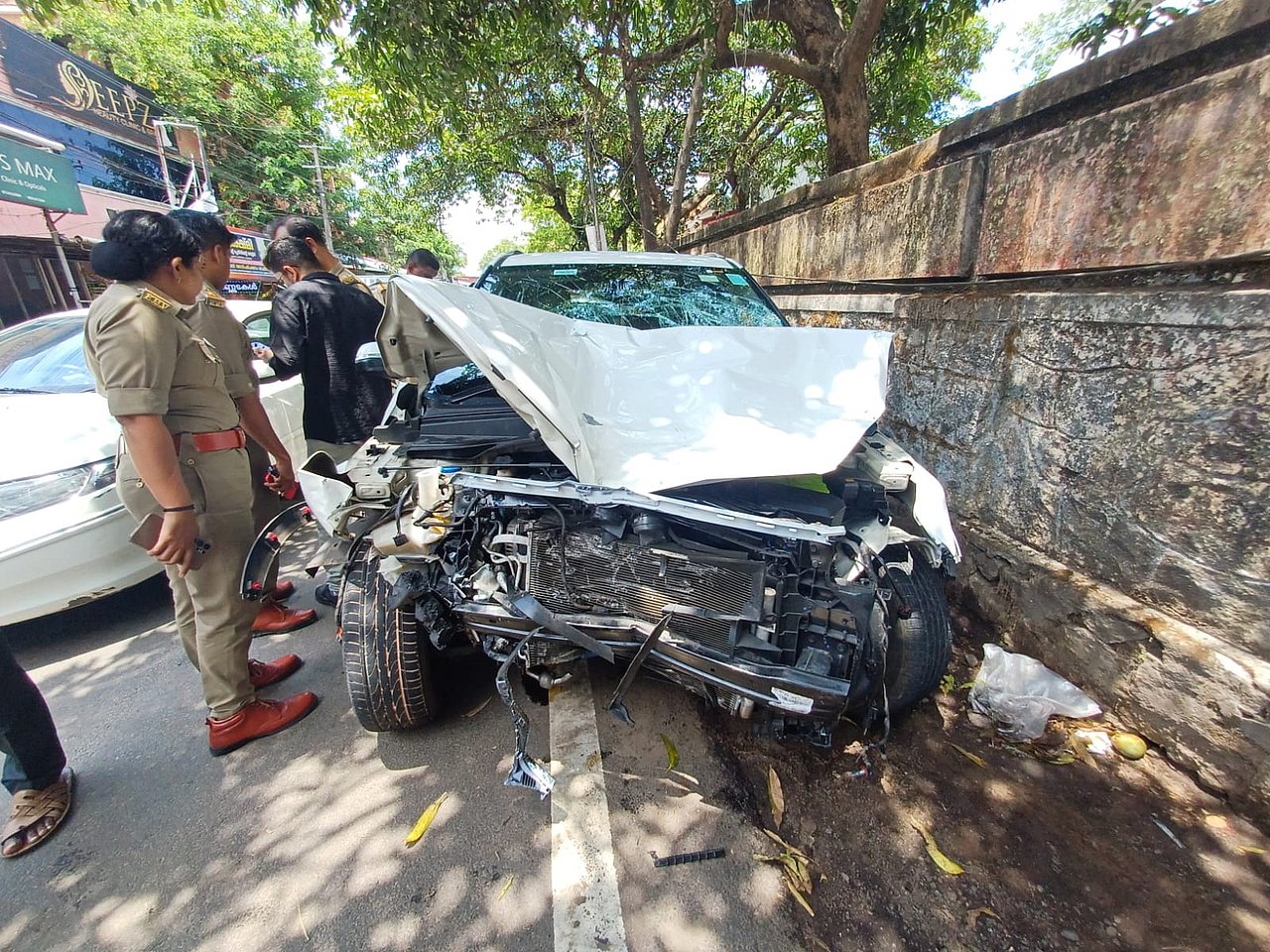 Woman killed after speeding car mounts footpath at Kowdiar