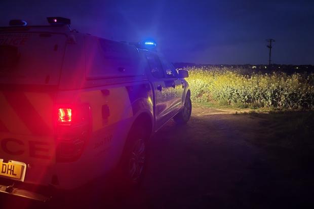 Police officers make arrest during night patrol in Oxfordshire