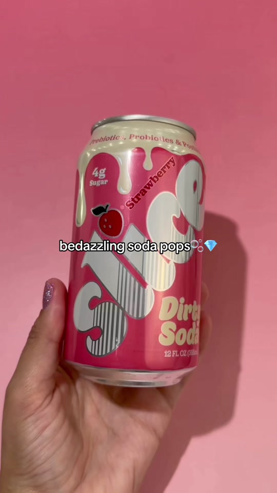 Bedazzled soda cans orange and strawberry DIY project