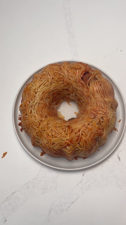 Creative bundt spaghetti dish with cheesy layers