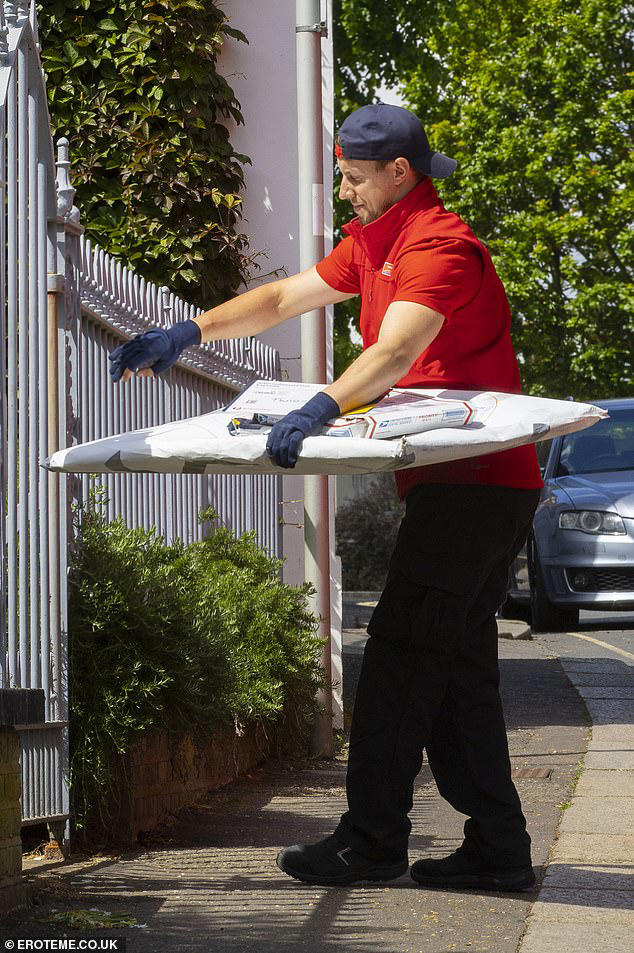 The very busy British postman delivering crates of David Attenborough's ...