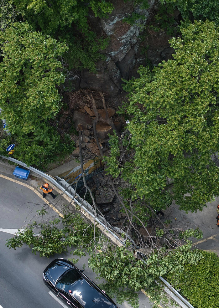 Passerby confirmed dead after being hit by falling rocks