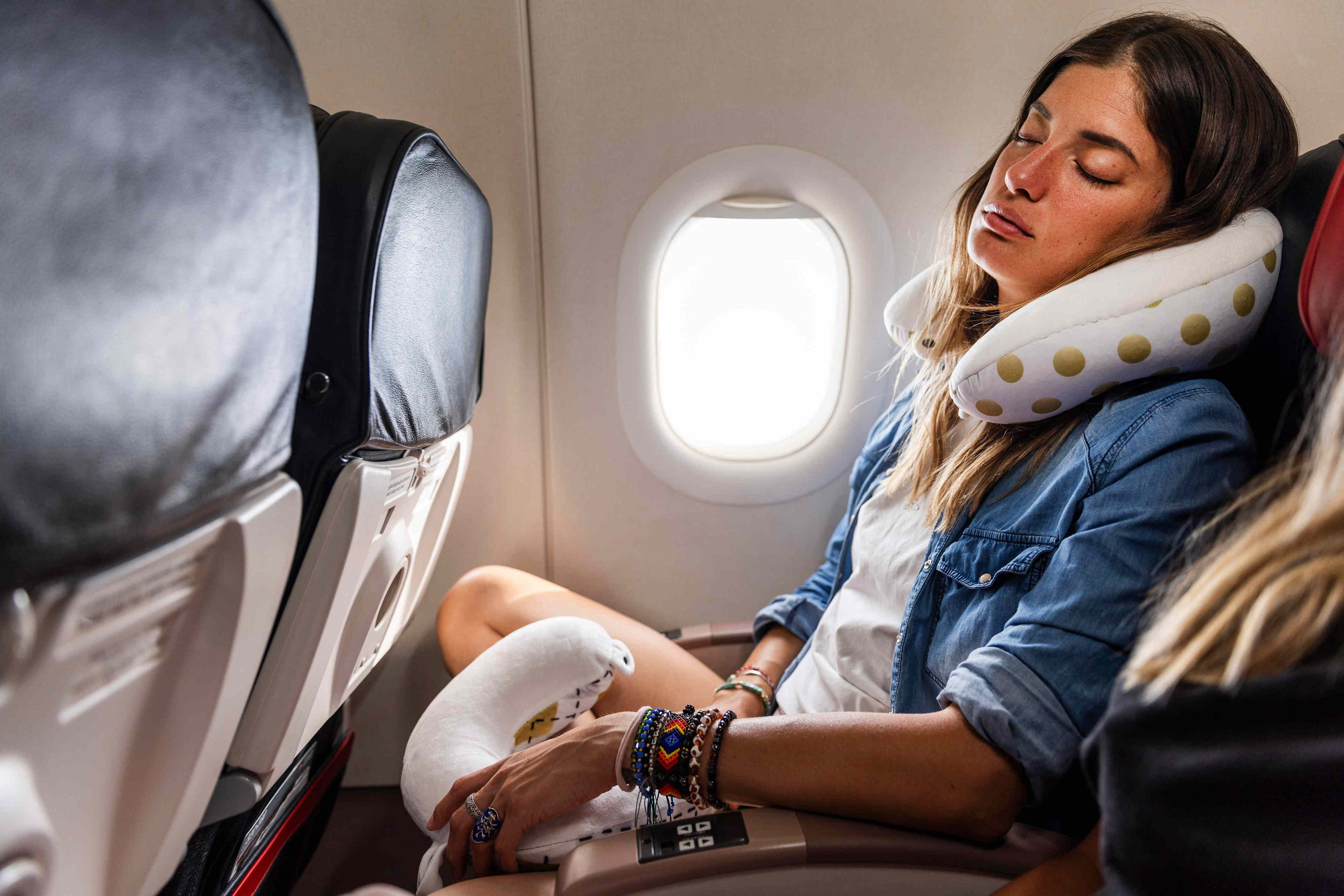 Can't sleep on planes? Don't try the viral neck pillow hack that's all ...