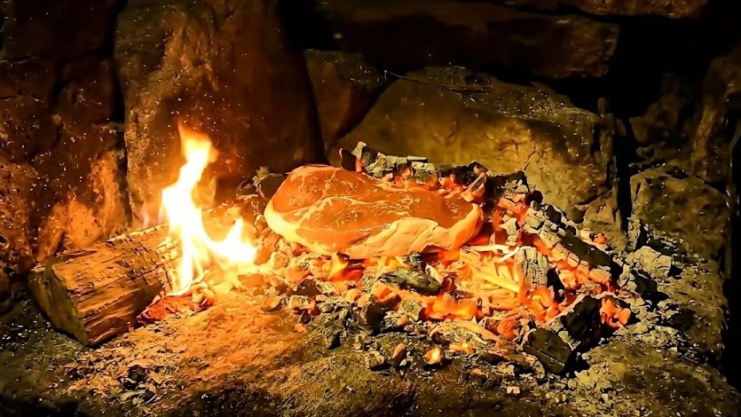 He cooked steak directly on the coals - seconds later, it came out perfect