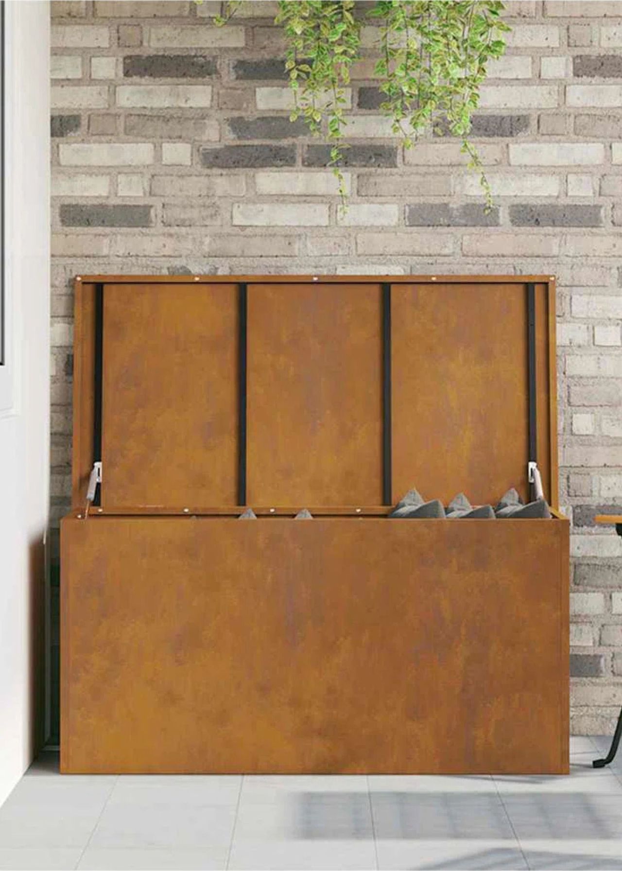 Forget tacky plastic garden storage boxes — this weathered steel chest ...